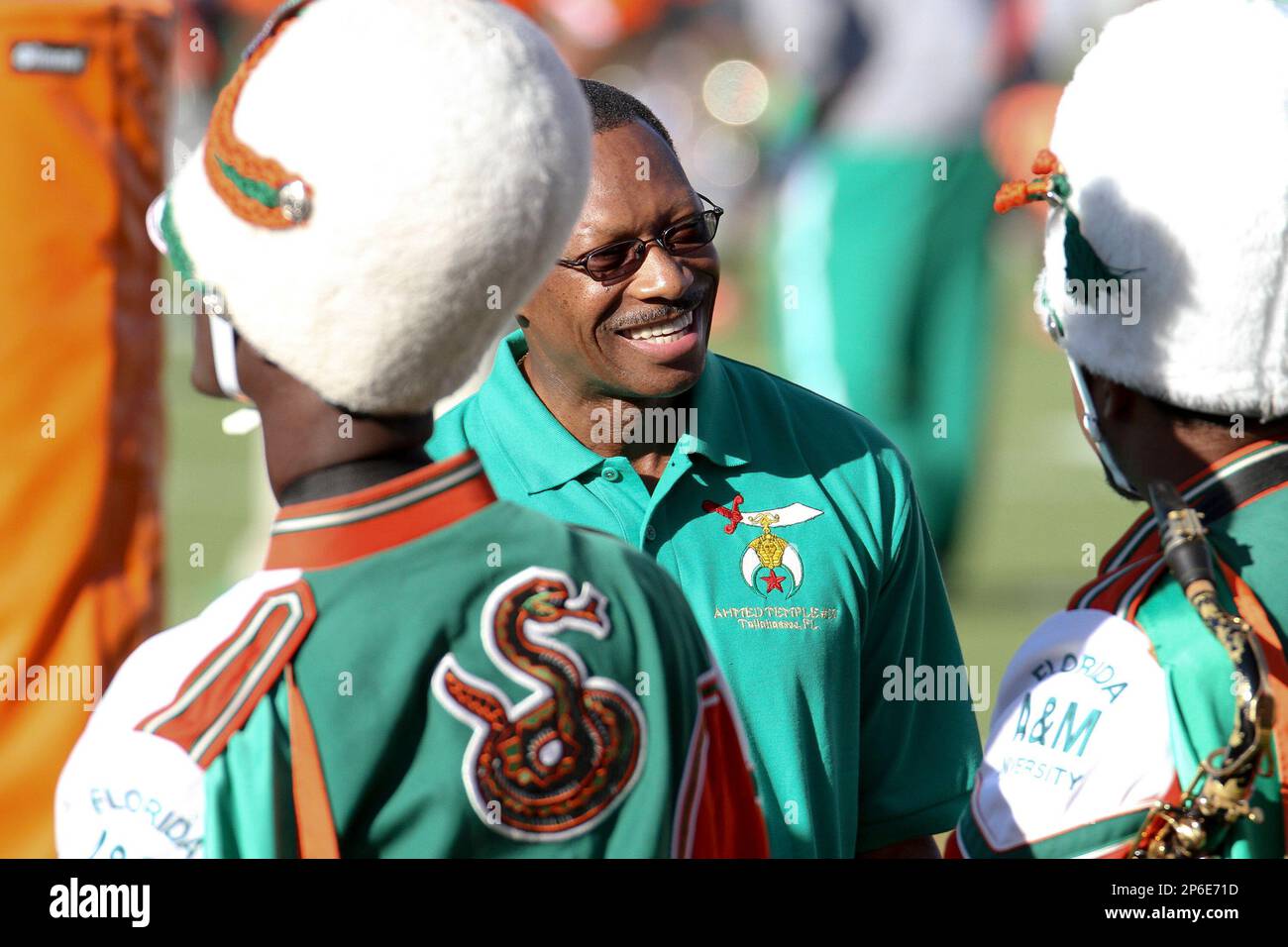 Florida A&M University President James Ammons talk with members of the ...