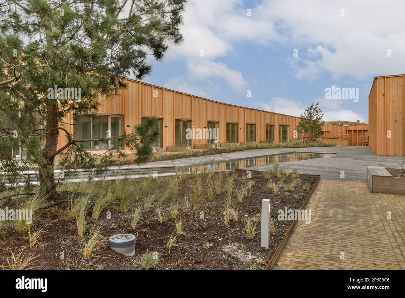 an outside area with trees and plants in the middle part of the ...