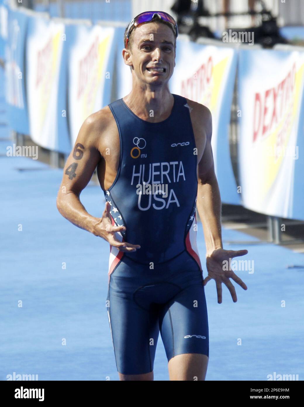 Manuel Huerta, of Miami, FL, on the finish line at the ITU World ...