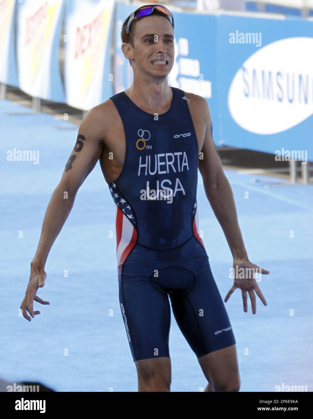 Manuel Huerta, of Miami, FL, on the finish line at the ITU World ...