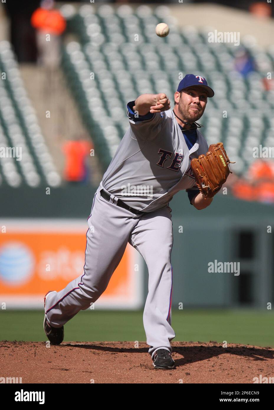 Texas Rangers pitcher Colby Lewis (48) delivers to a Baltimore Orioles ...