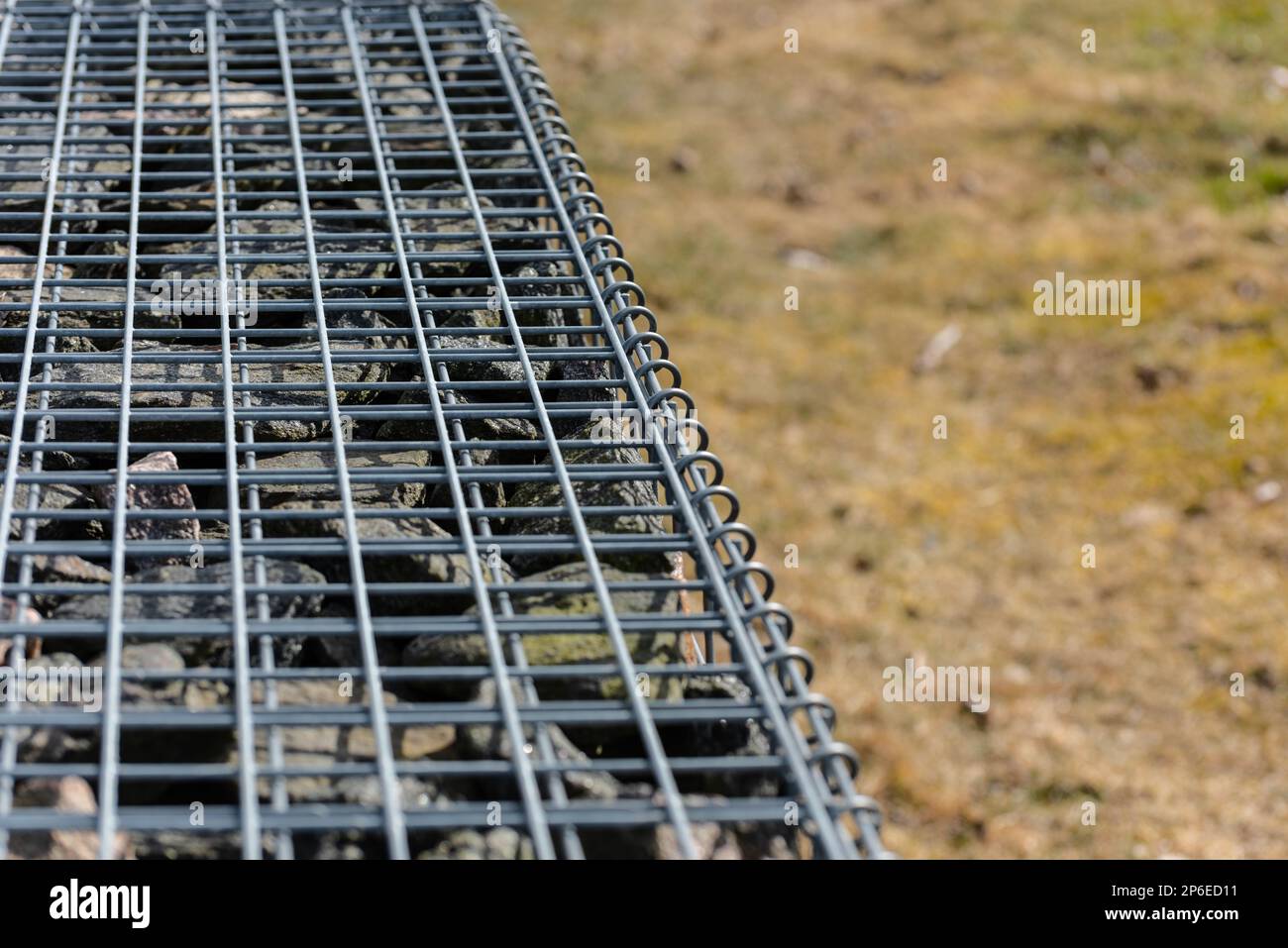 Top of a gabion stone cage Stock Photo - Alamy