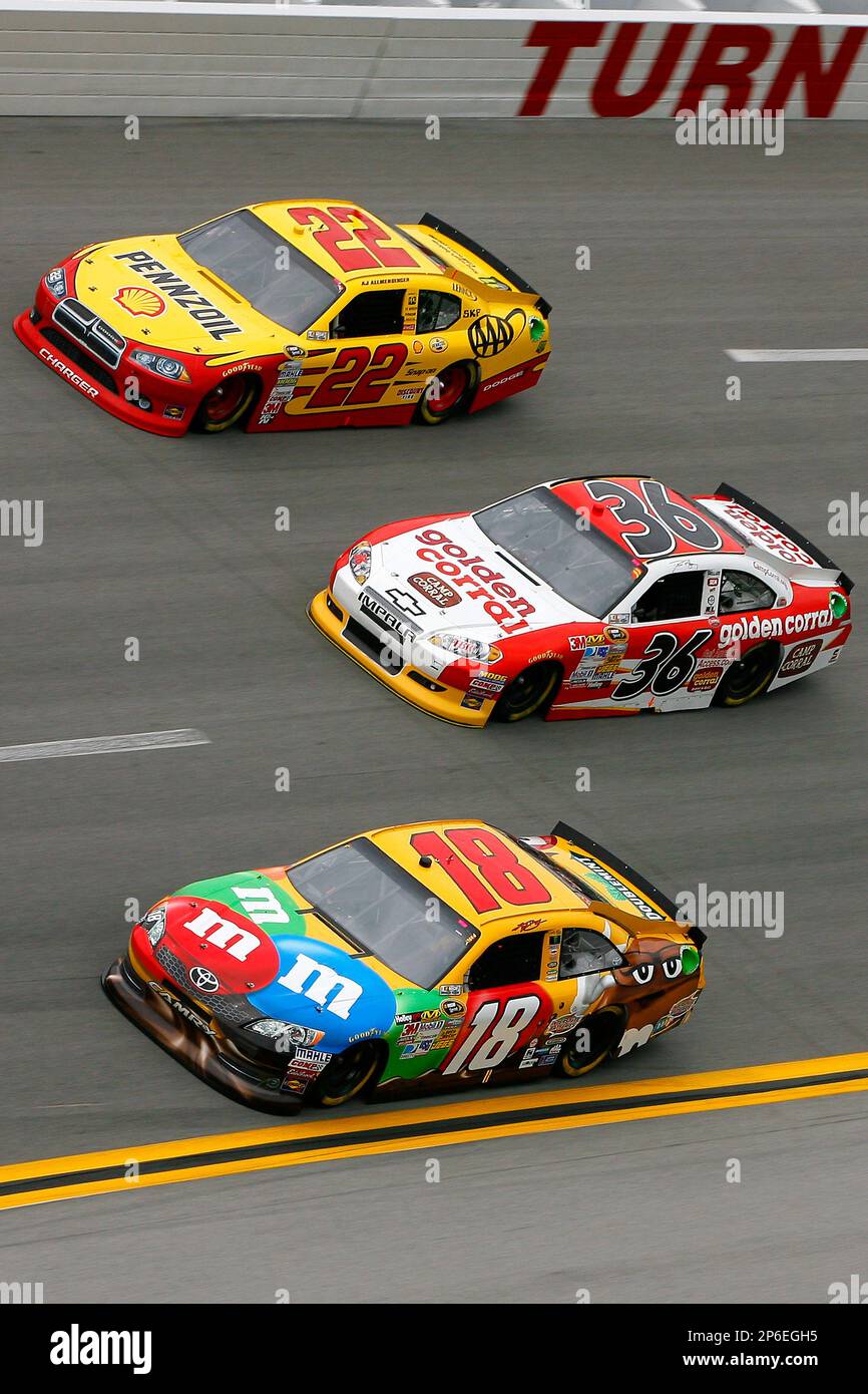 Kyle Busch (18), Dave Blaney (36) and A.J. Allmendinger (22) during ...