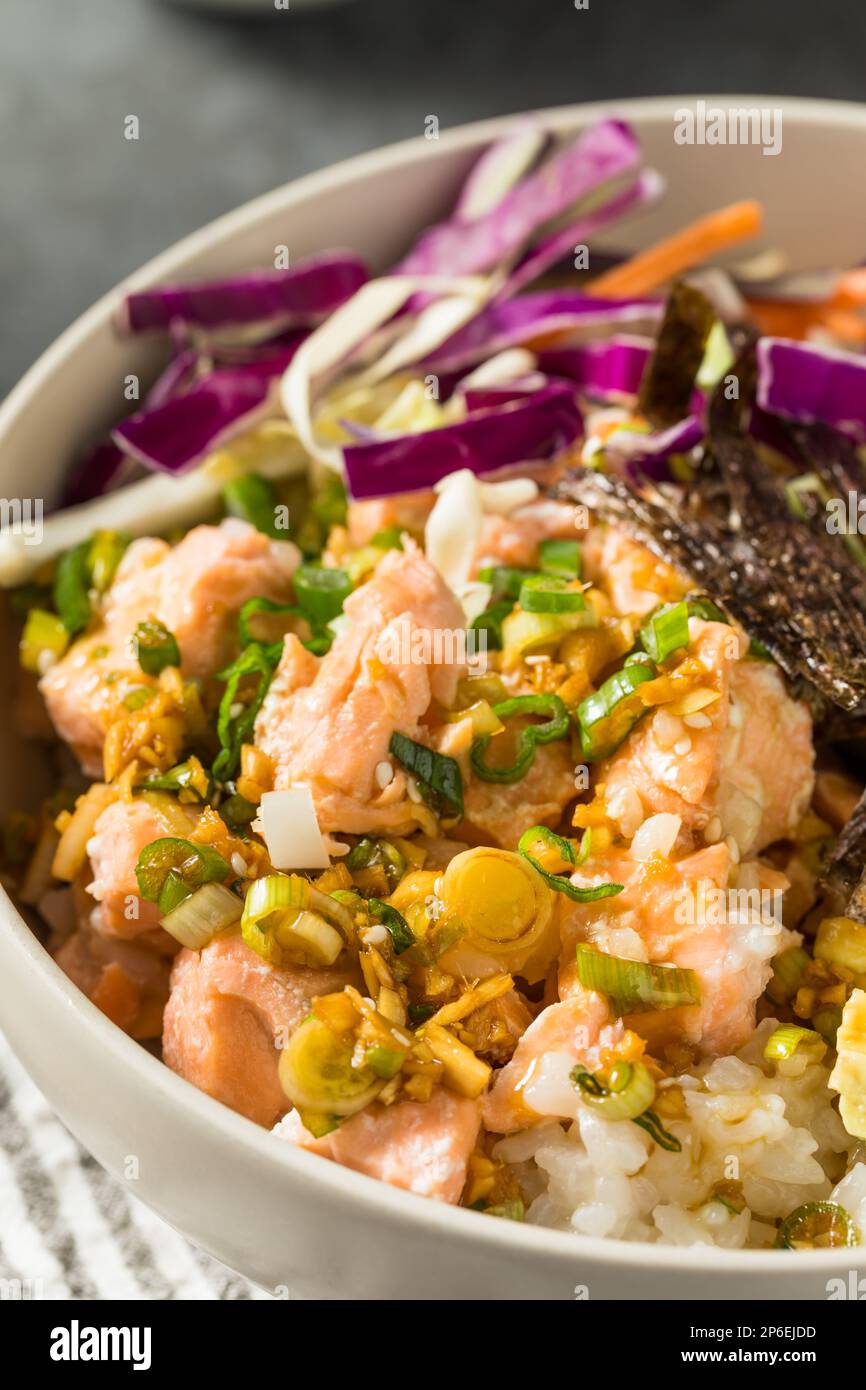 Homemade Asian Sesame Salmon Bowl with Rice and Cucumber Stock Photo ...