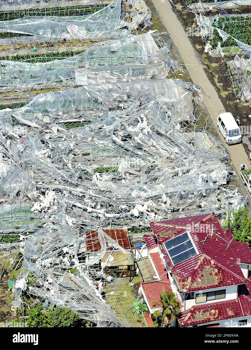 A photo shows greenhouses destroyed by a tornado seen in Mooka, Tochigi ...