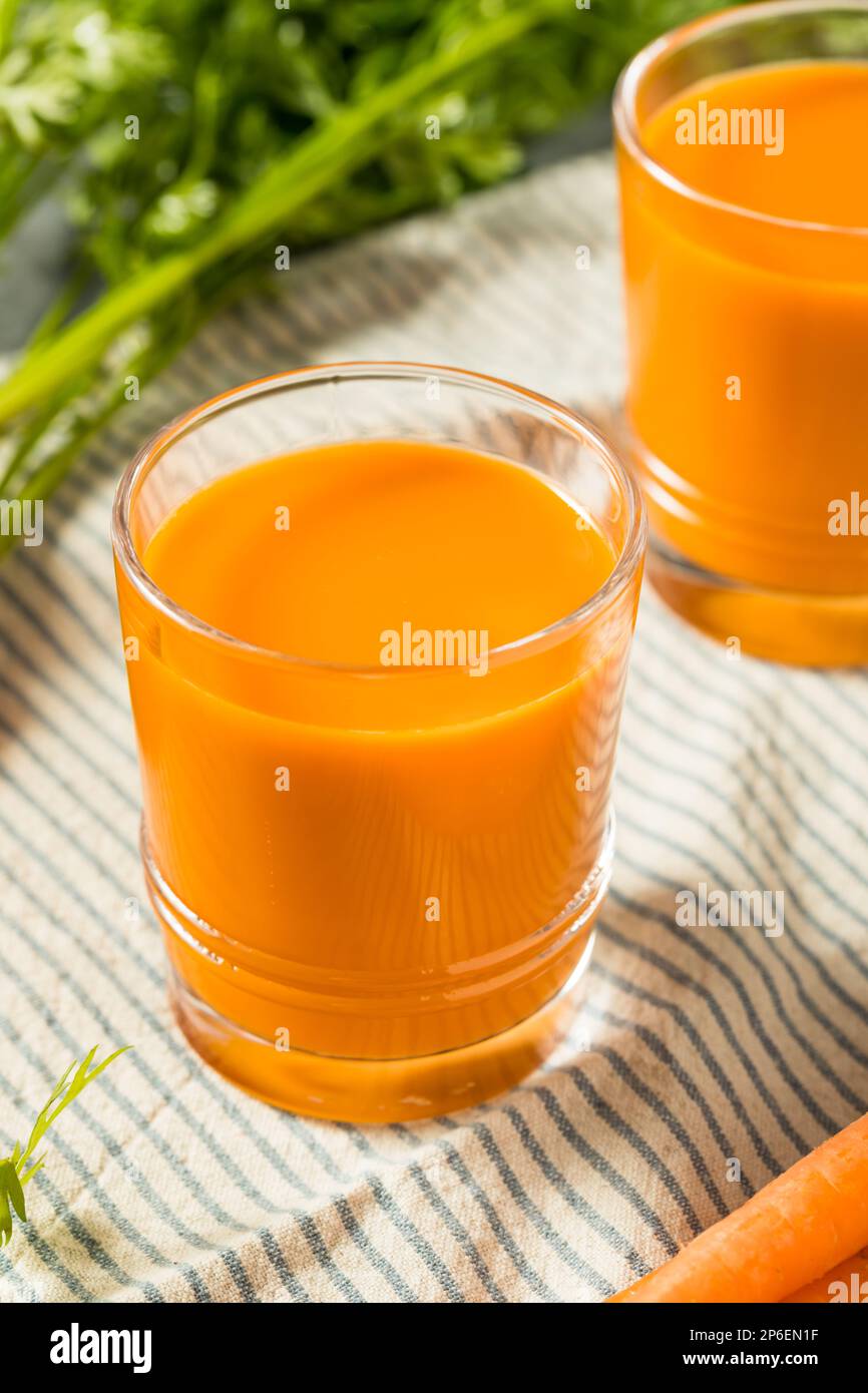 Cold Refreshing Raw Carrot Juice Ready to Drink in a Glass Stock Photo ...