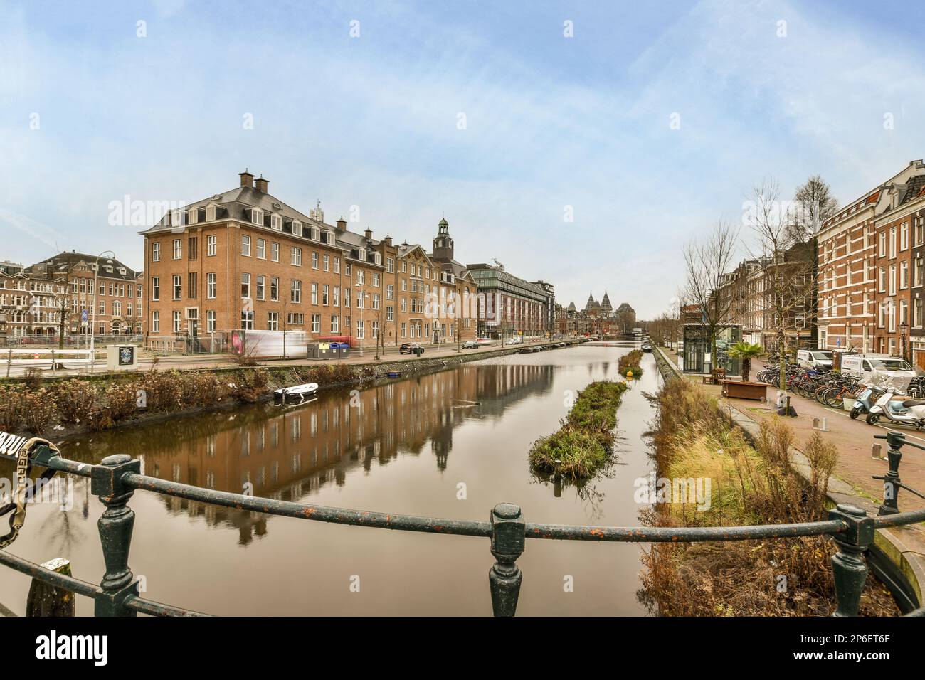 Amsterdam, Netherlands - 10 April, 2021: a canal with buildings in the ...