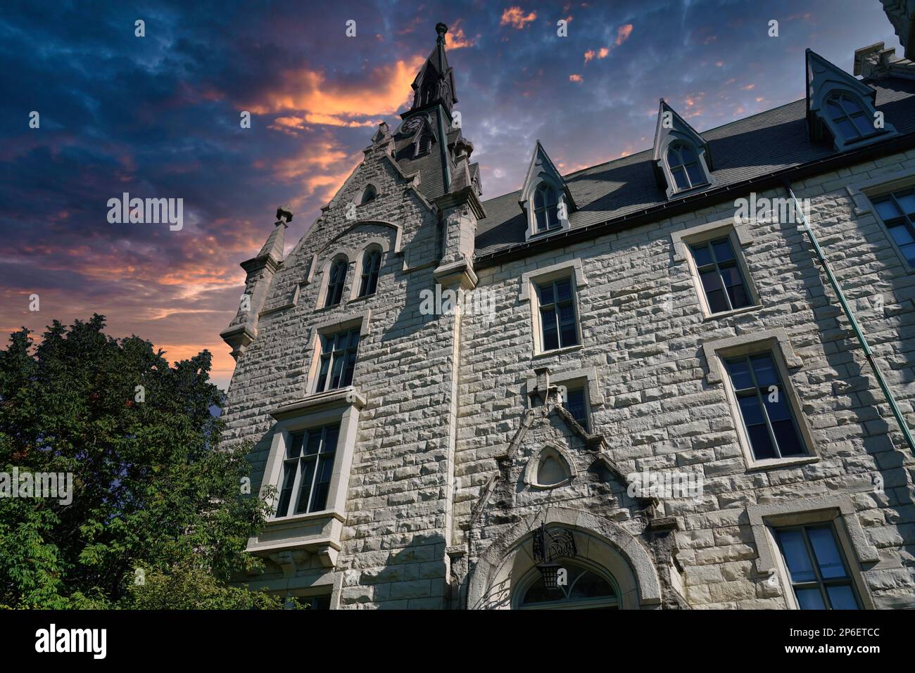 Old stone gothic style building with gables and dormer windows Stock ...