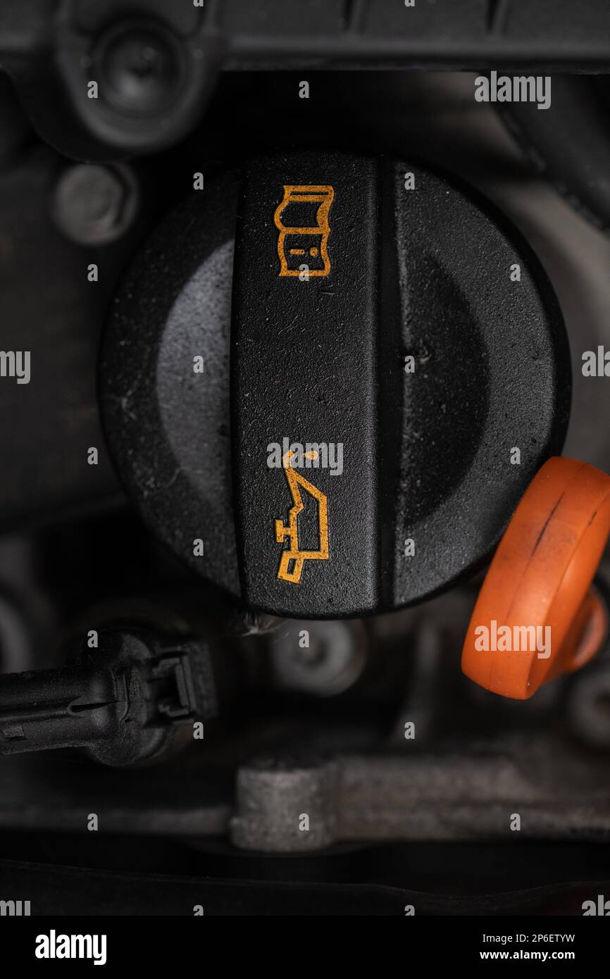 Oil filler cap on a car engine Stock Photo - Alamy
