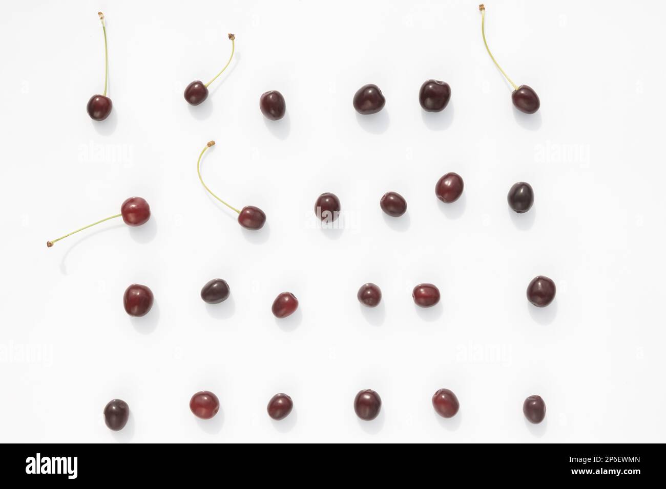 sweet cherries, top view on a white background Stock Photo - Alamy