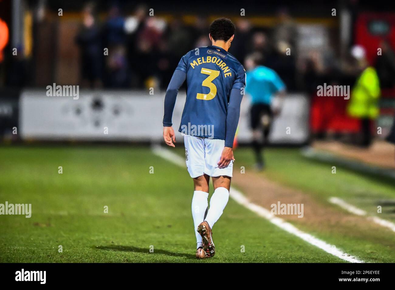 Max Melbourne (3 Morecambe) holds hamstring and is substituted during ...