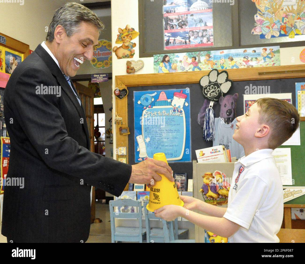 Congressman Louis Barletta receives a megaphone from Holy Family ...