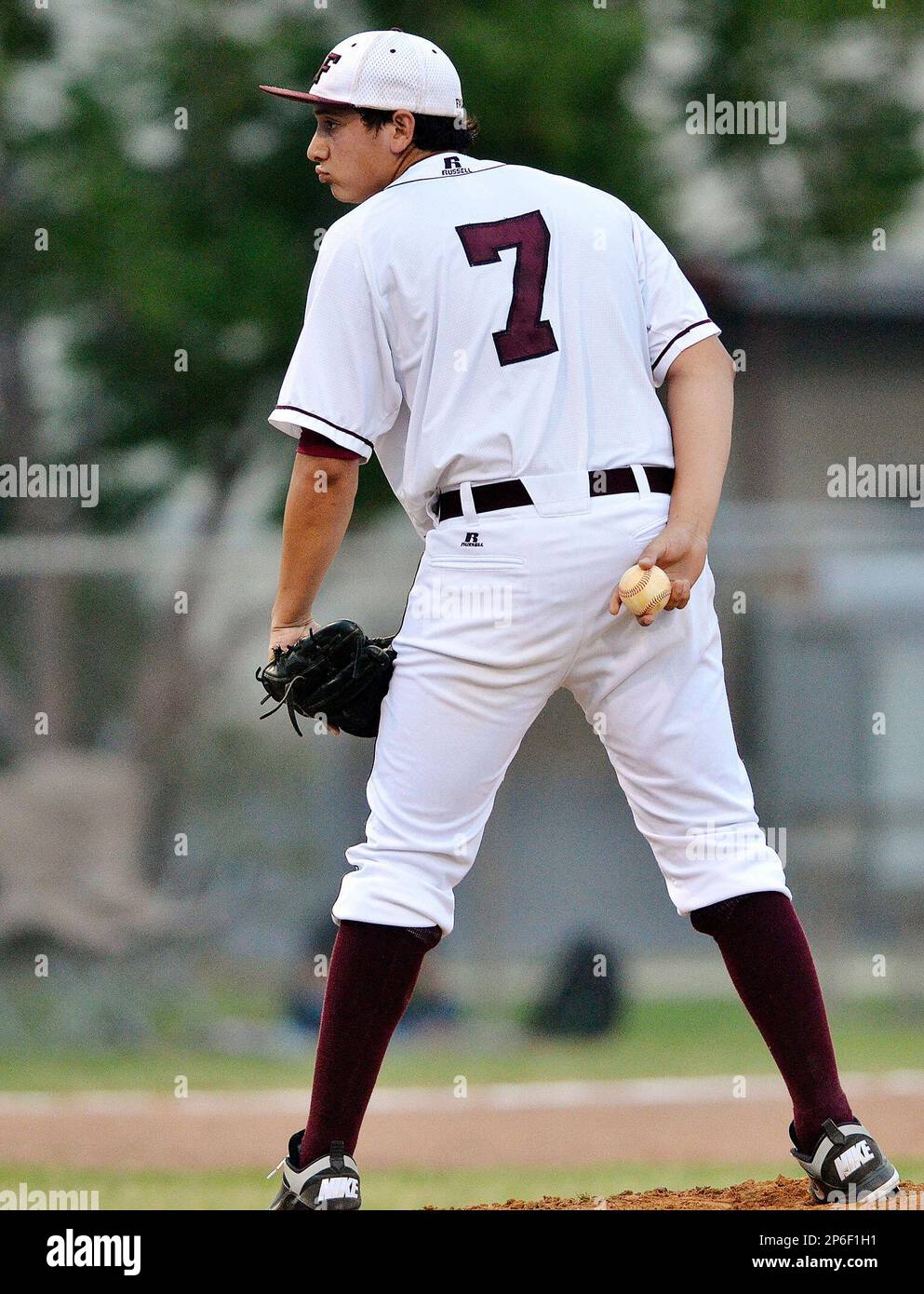 Los Fresnos pitcher Christopher Ceballos (7) prepares to throw to ...