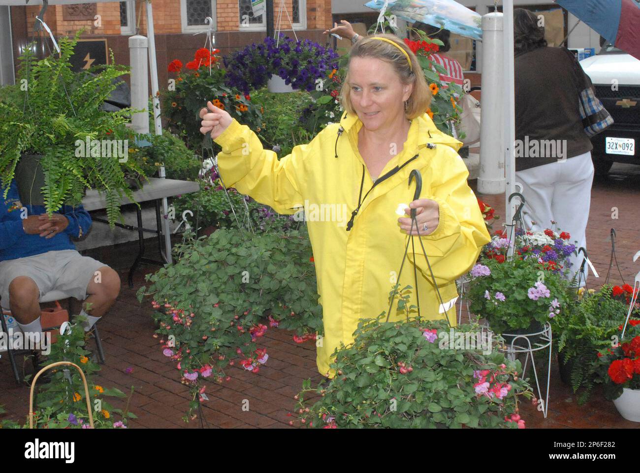 Laurie Decker of Frostburg, Md., purchases a Fuschia plant at the 16th ...