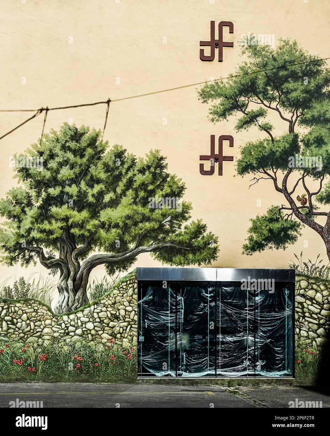 Mural of tree on wall of building, Geneva, Switzerland Stock Photo - Alamy