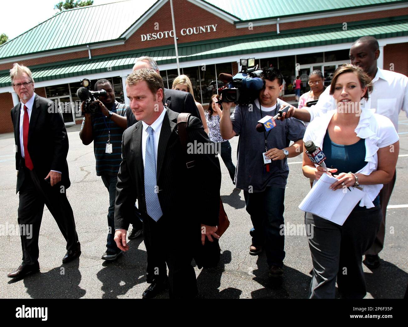 Southaven, Mississippi mayor Greg Davis, center, exits a Southaven ...