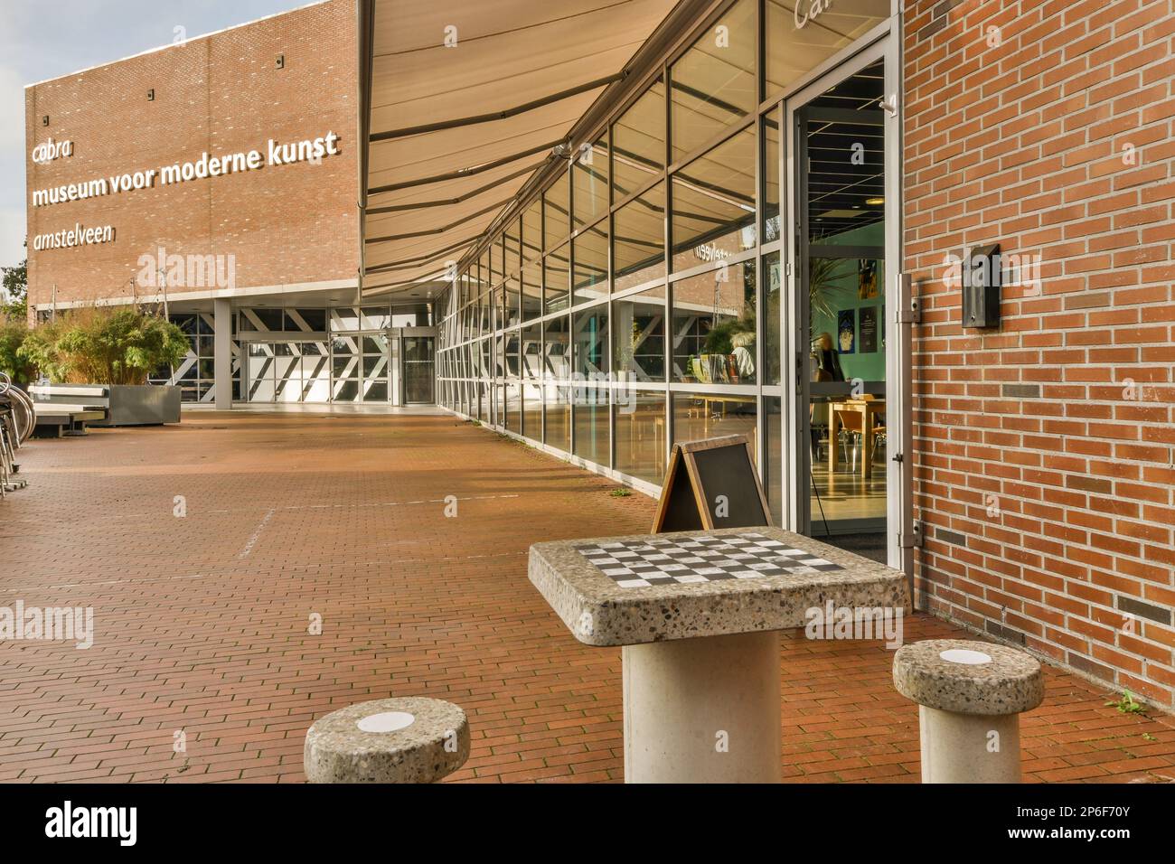 the outside of a building that looks like it's made out of red brick ...