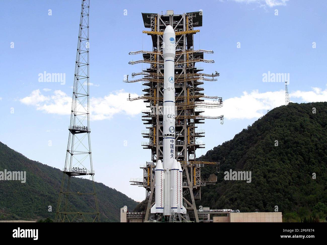 A Long March 3B rocket carrying two Beidou satellites sits on the ...