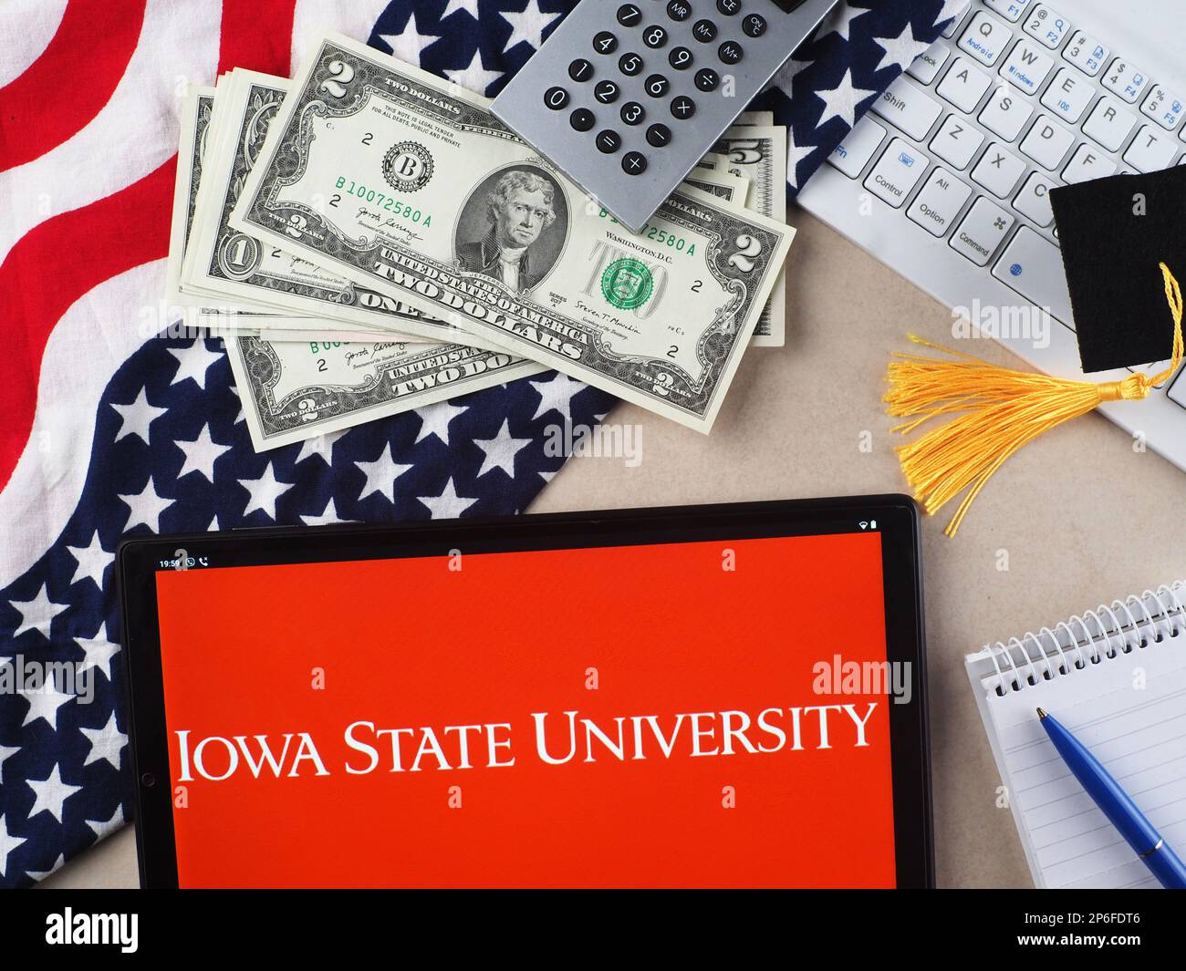 In this photo illustration, Iowa State University logo seen displayed ...