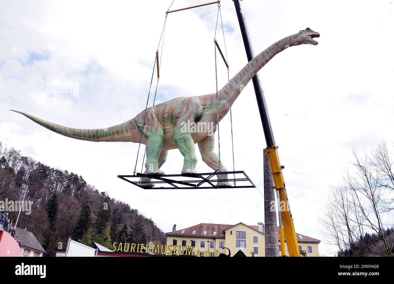 A life-size model of a 30 meters long Turiasaurus is lifted into the ...