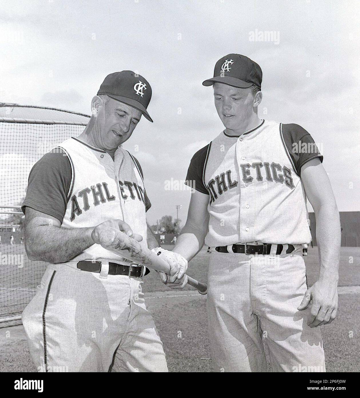 Hall of Fame infielder Luke Appling gives batting tips to rookie ...