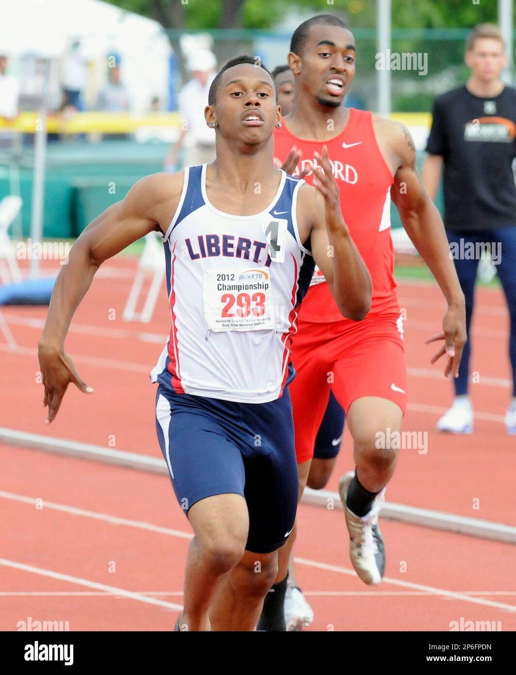Liberty's, Leonard Robbins, left, wins the Men 400 meter dash, Saturday ...