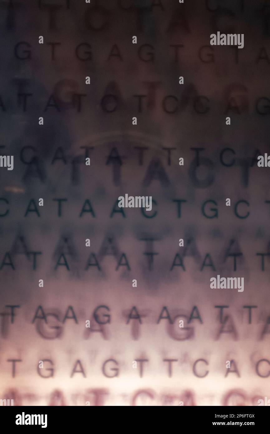 Written letters code on a translucent surface Stock Photo - Alamy