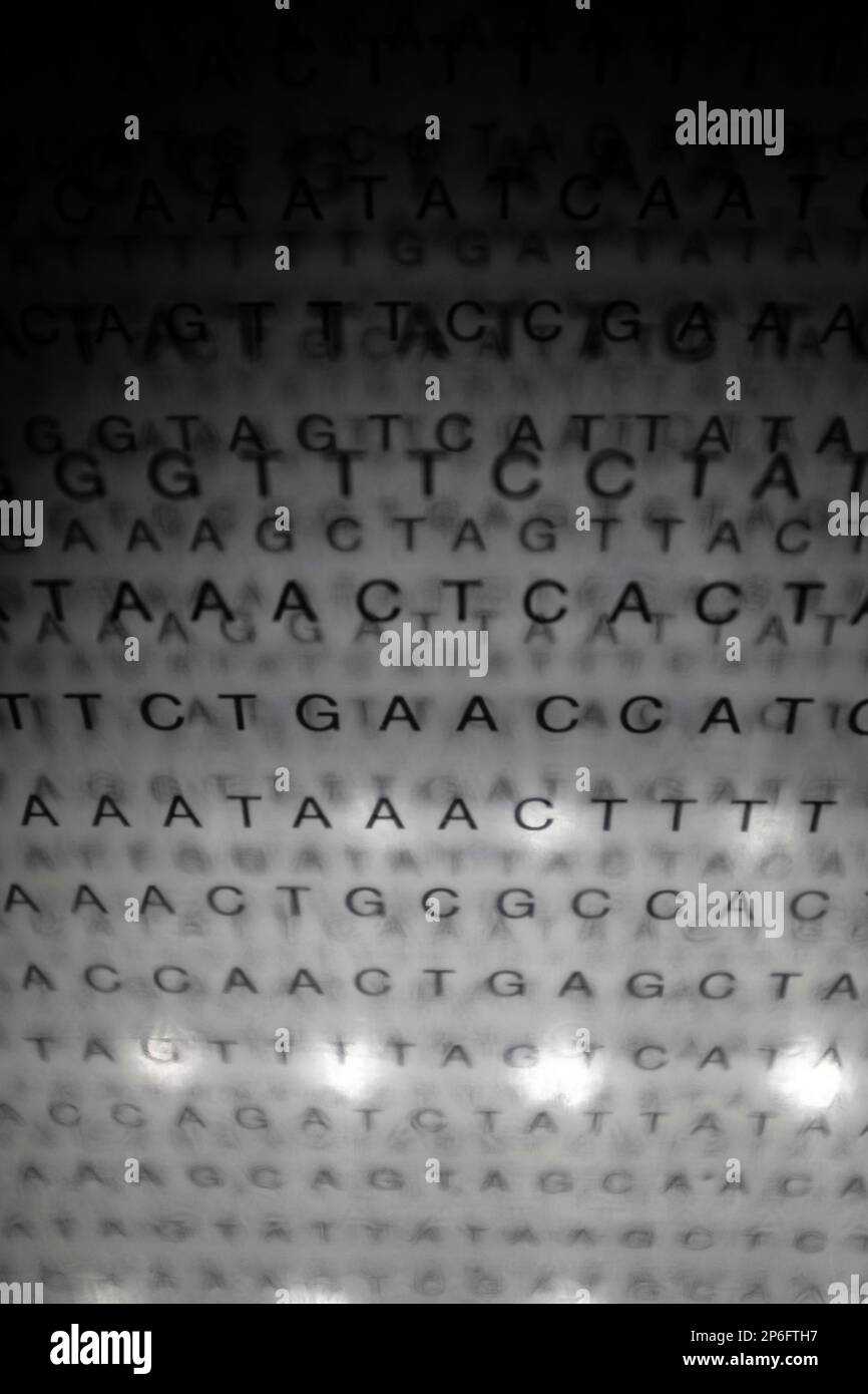 Written letters code on a translucent surface Stock Photo - Alamy