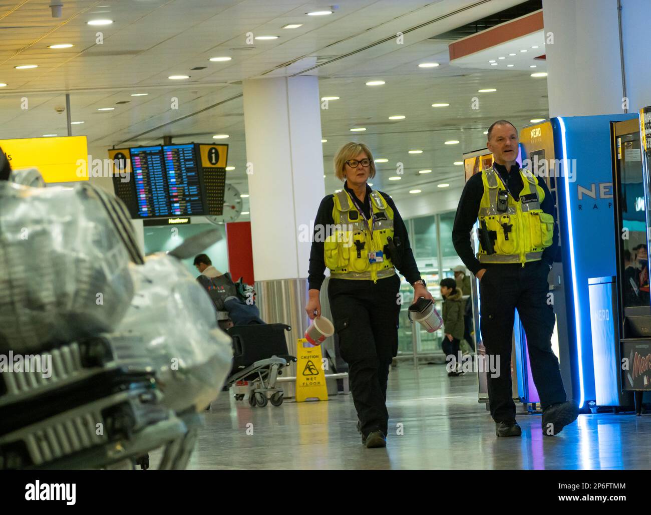 UK Border Force Staff in London Heathrow Terminal 3 Stock Photo - Alamy