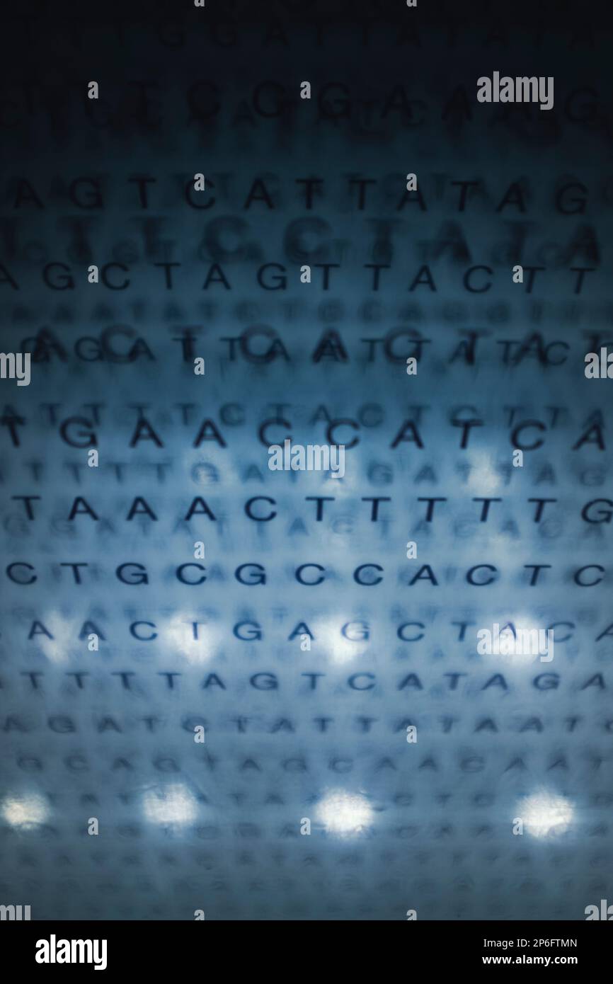 Written letters code on a translucent surface Stock Photo - Alamy