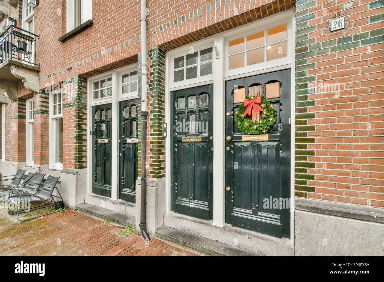 Amsterdam, Netherlands - 10 April, 2021: a brick building with black ...