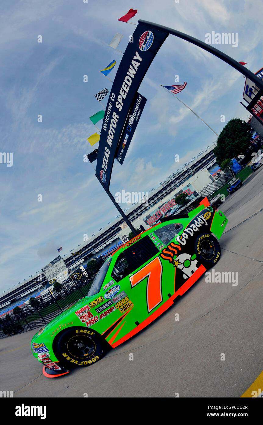 Danica Patrick enters the garage area during practice for Friday's O ...