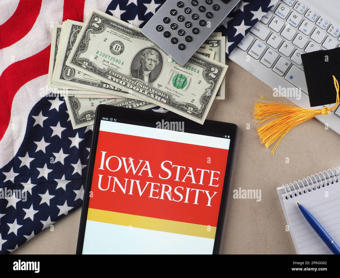 In this photo illustration, Iowa State University logo seen displayed ...