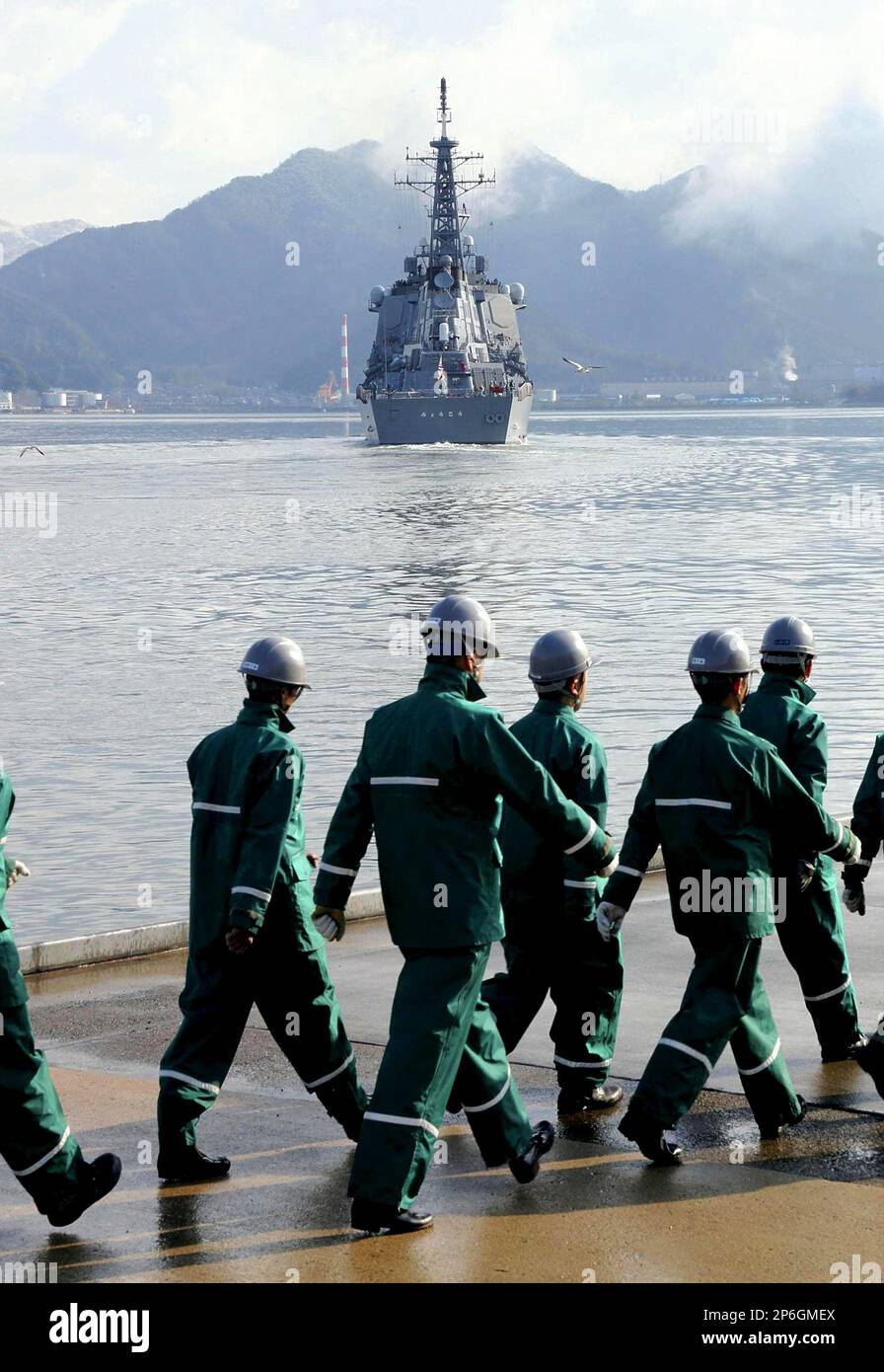 The Maritime Self-Defense Force Aegis destroyer Myoko (background ...