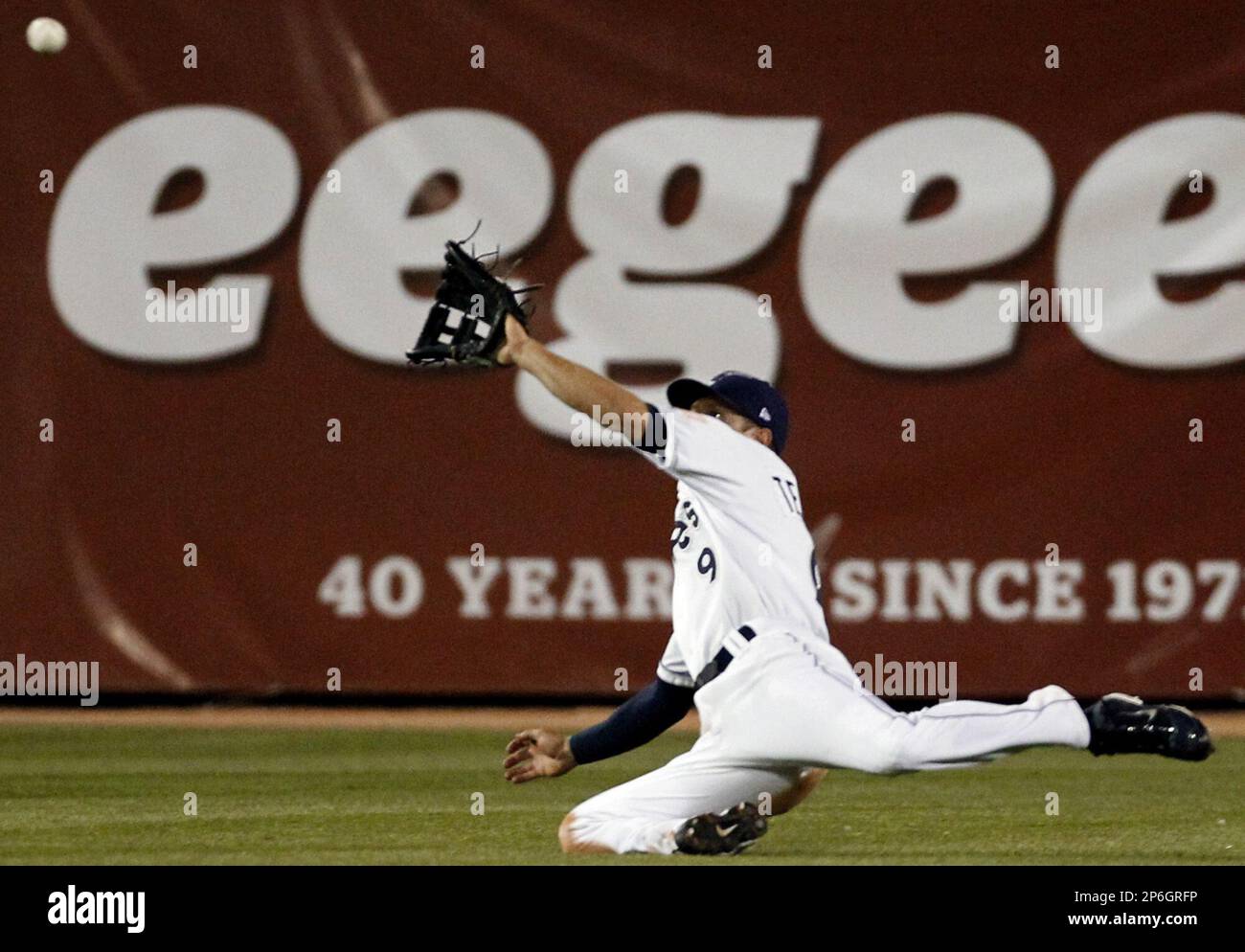 Tuscon Padres' center fielder Blake Tekotte makes a sliding catch on a ...