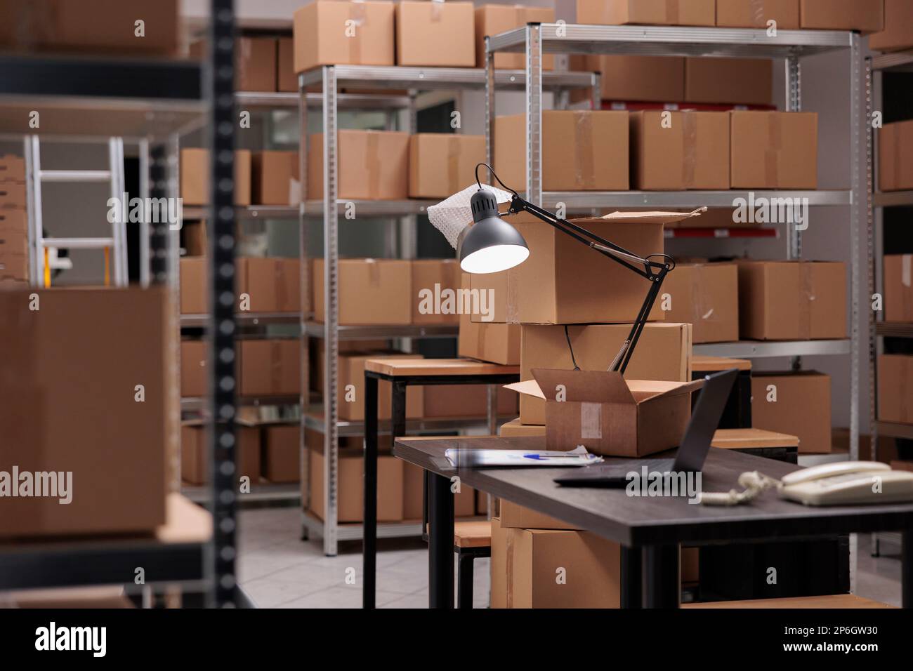 Empty warehouse delivery department full with rows of shelves with ...