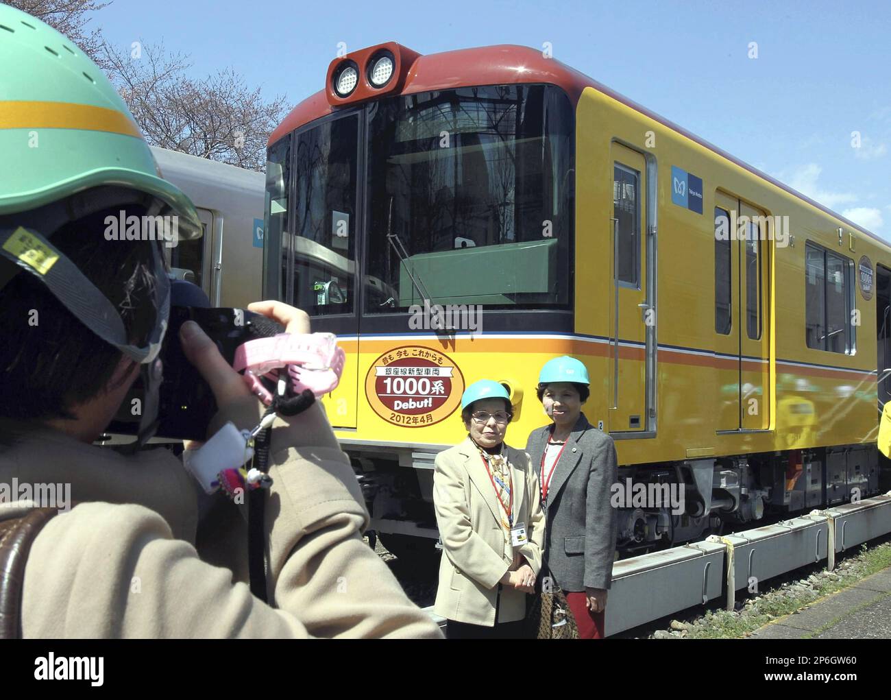 Local people take a photo of a new 1000 series subway train of Tokyo ...
