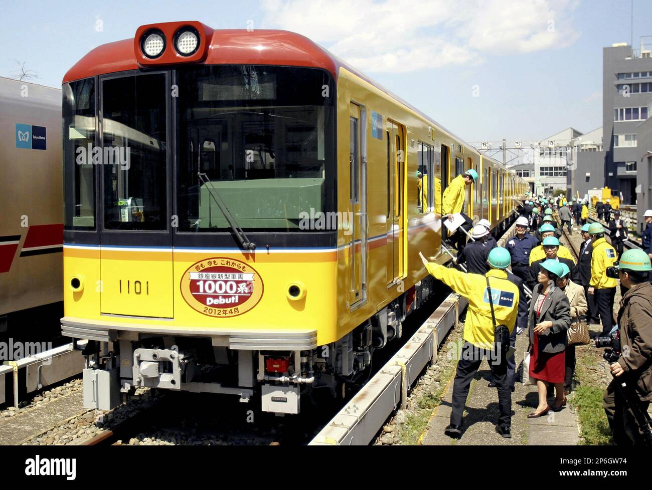 People line up to see a new 1000 series subway train of Tokyo Metro Co ...