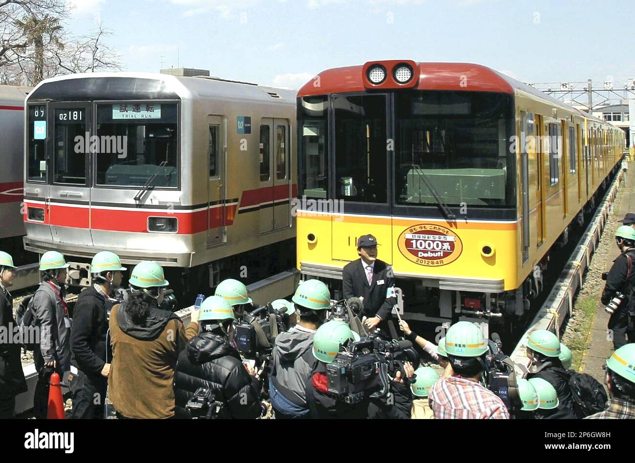 A new 1000 series subway train (R) of Tokyo Metro Co. Ginza Line during ...