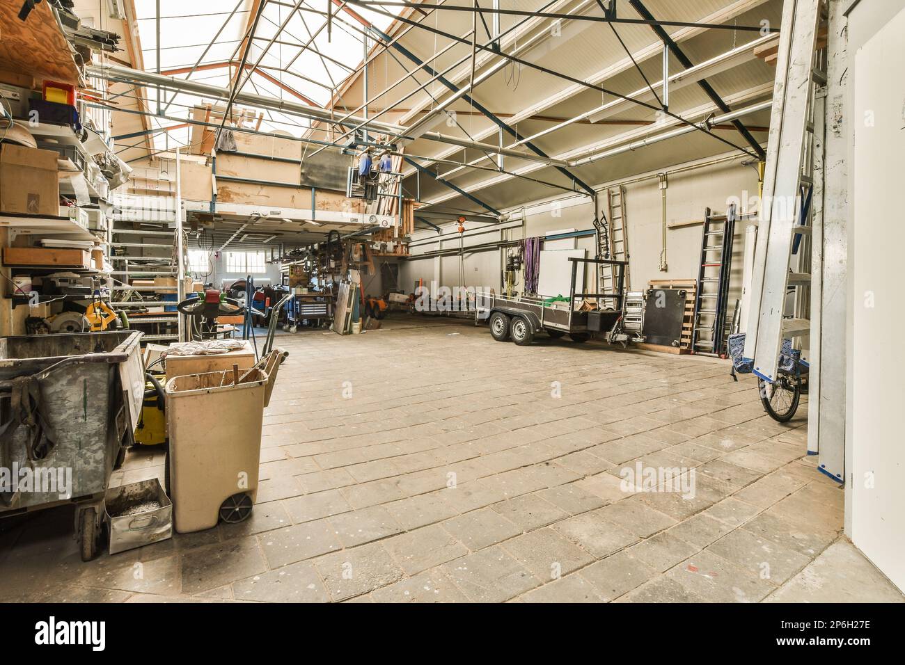 the inside of a building that is being used as a workshop for various ...