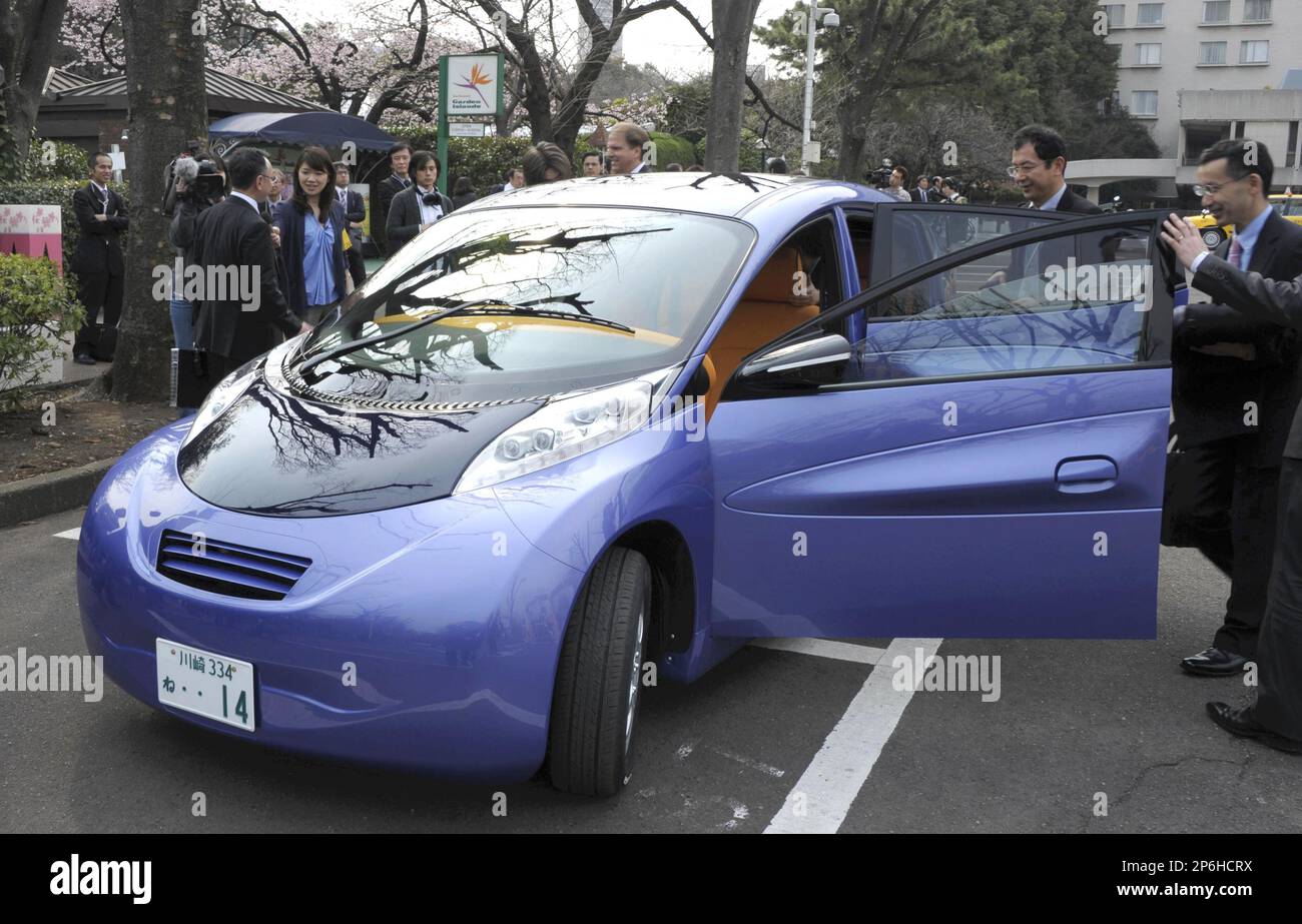 SIM-Drive Corporation unveils its new electric vehicle SIM-WIL during a ...