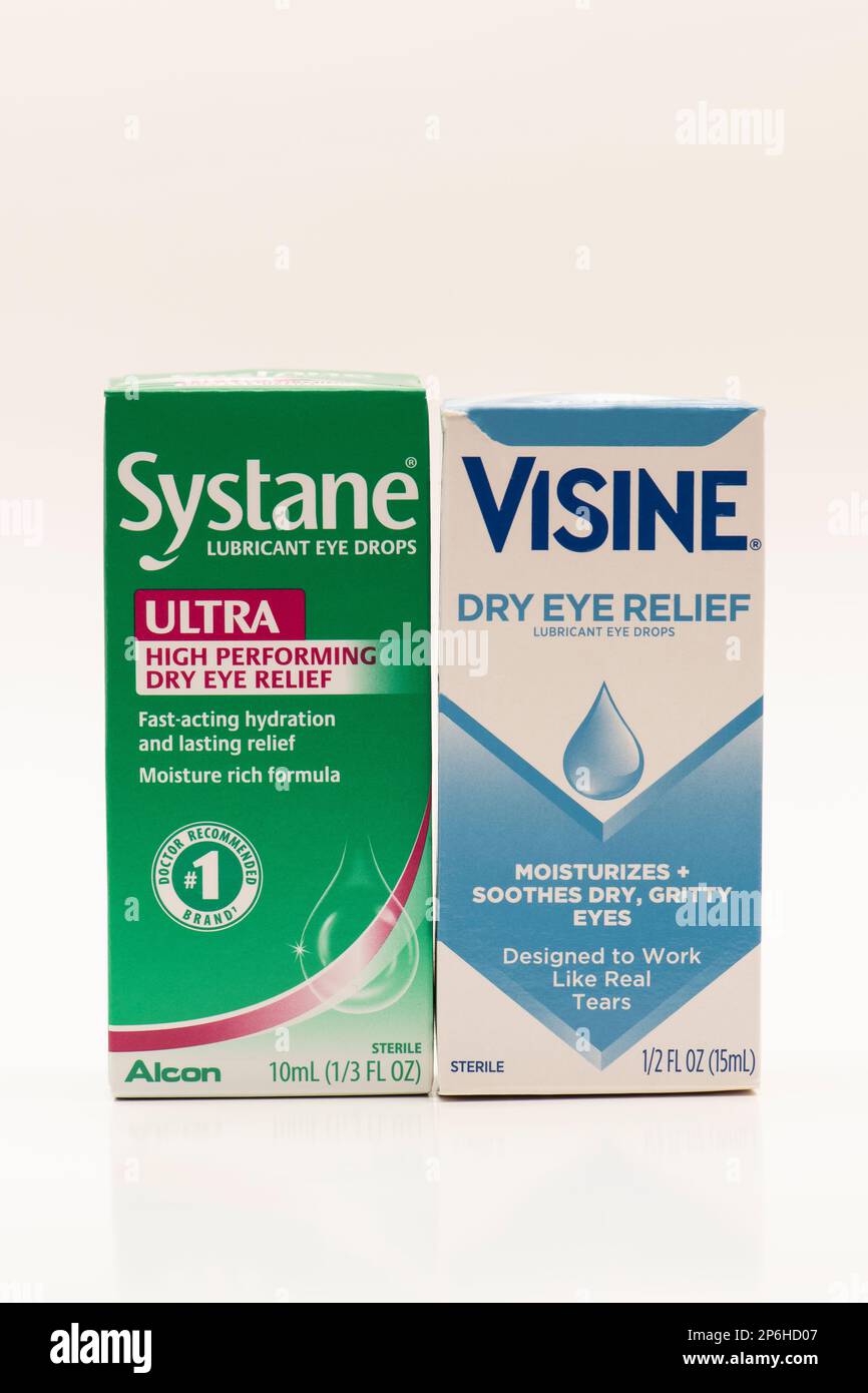 A bottle of Visine and Systane eye drops on white background Stock ...