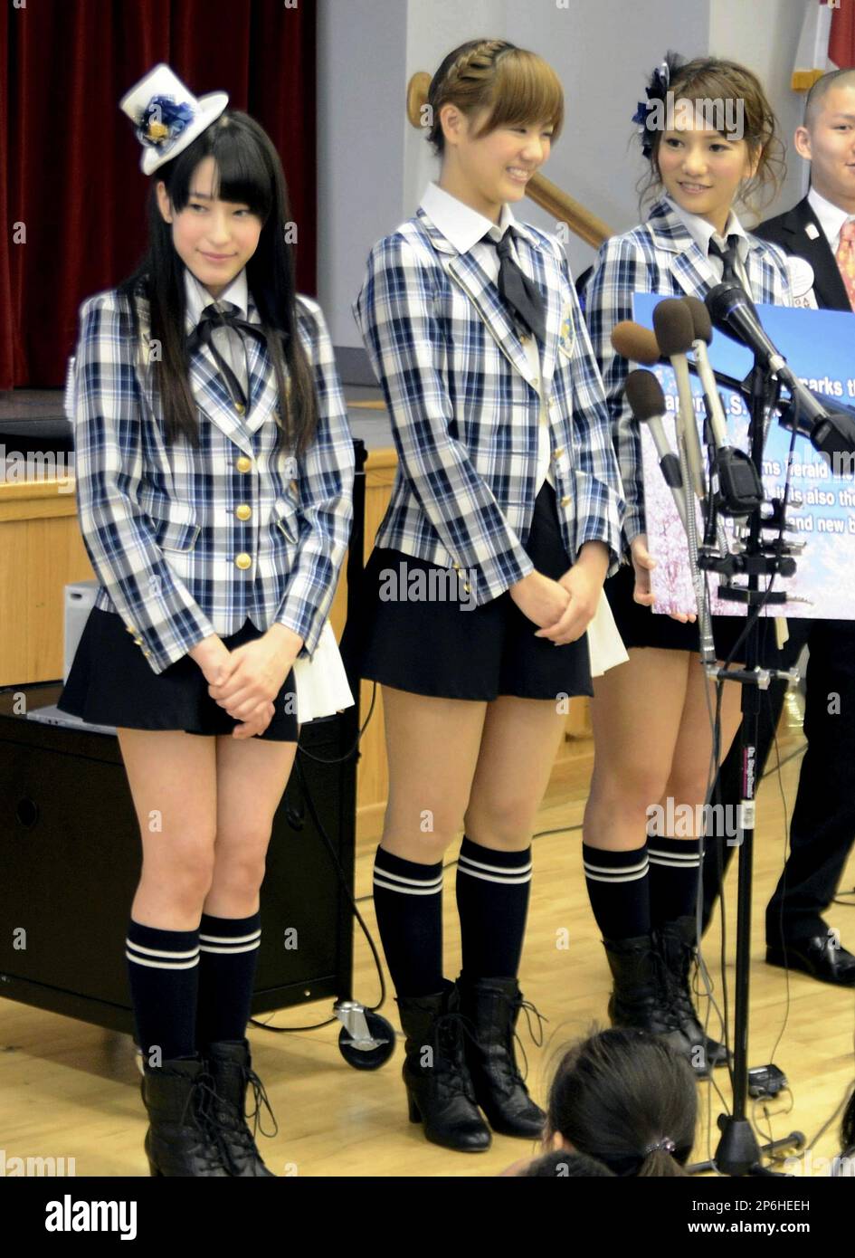 Japan's girl pop group AKB48 members (L-R) Rina Hirata, Sae Miyazawa ...
