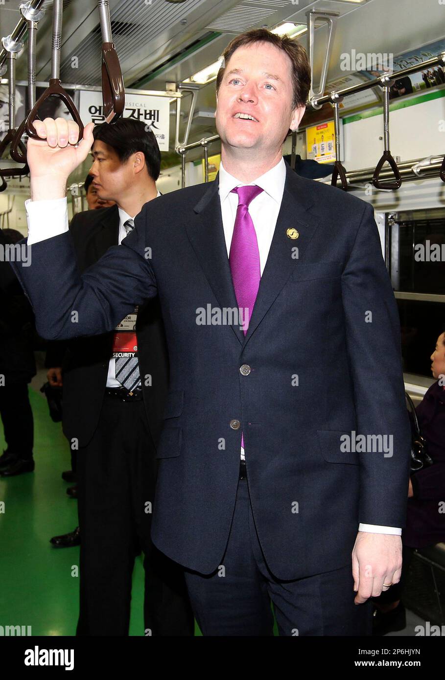 British Deputy Prime Minister Nick Clegg boards a Seoul subway on his ...