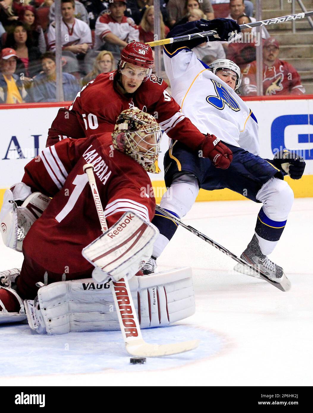 Phoenix Coyotes goalie Jason LaBarbera (1) makes a save on a shot by St ...