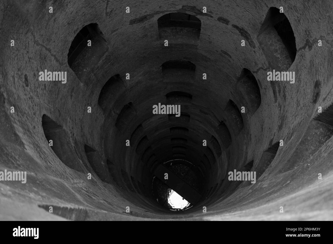 Saint Patrick well; Orvieto. The central well shaft with two helical ...
