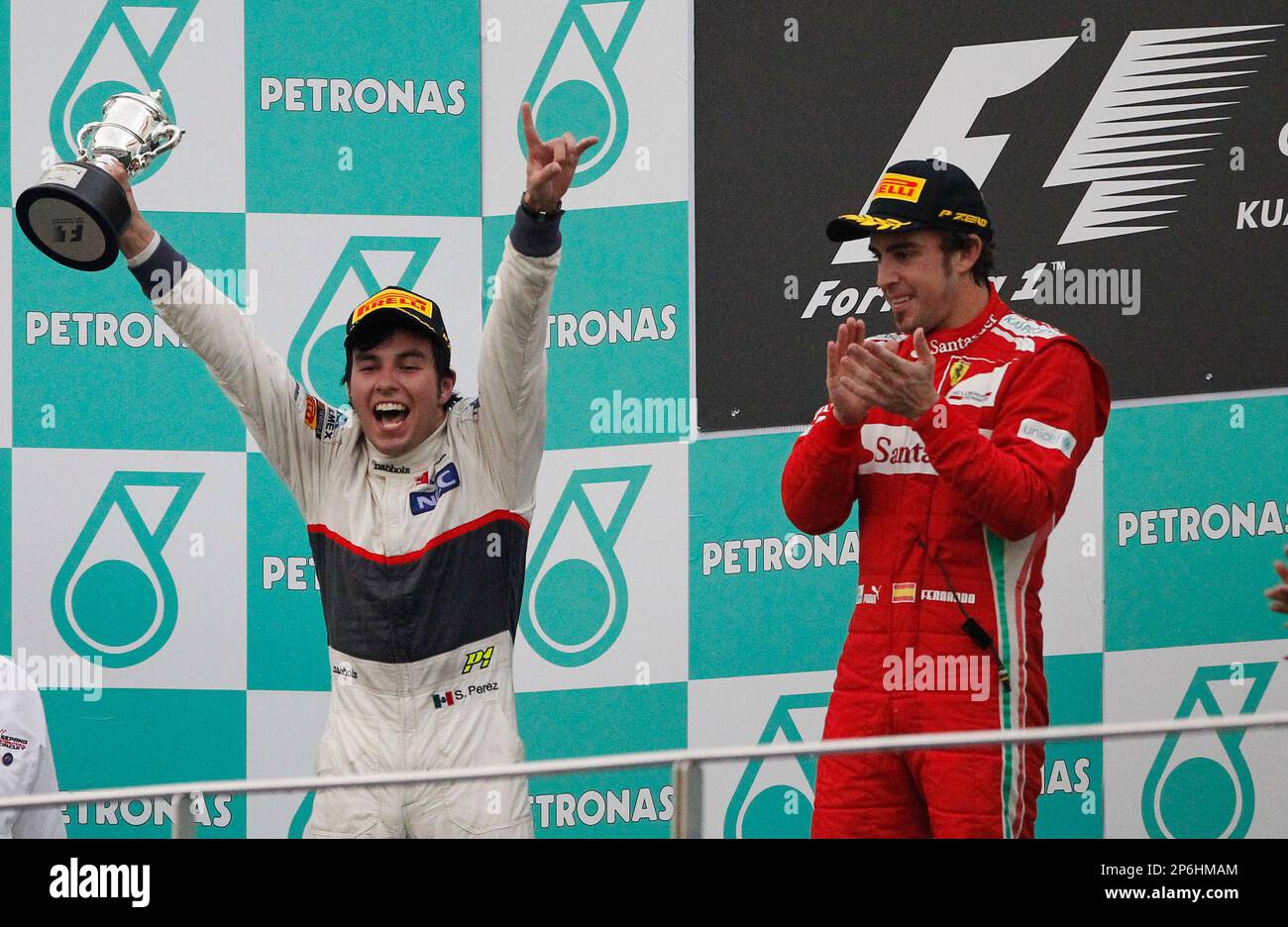 Sauber Formula One driver Sergio Perez of Mexico celebrates his second ...
