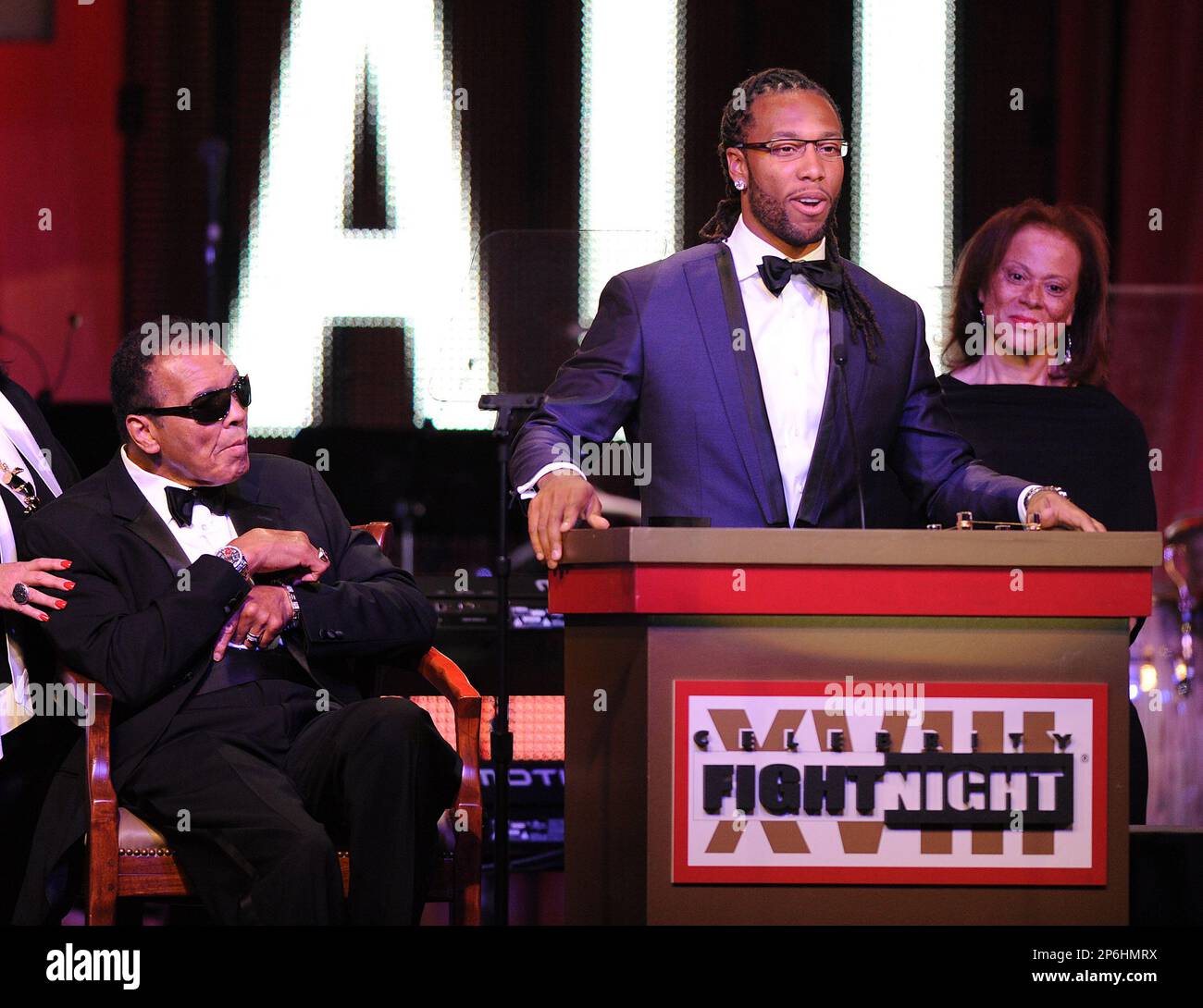 PHOENIX, AZ - March 24: (L-R) Muhammad Ali, Larry Fitzgerald, and ...