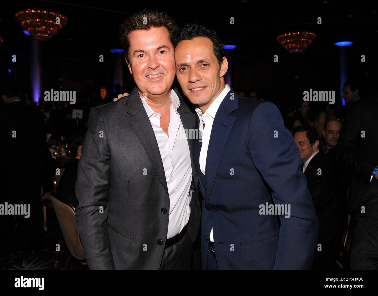 BEVERLY HILLS, CA - MARCH 20: Simon Fuller (L) and Marc Anthony attend ...