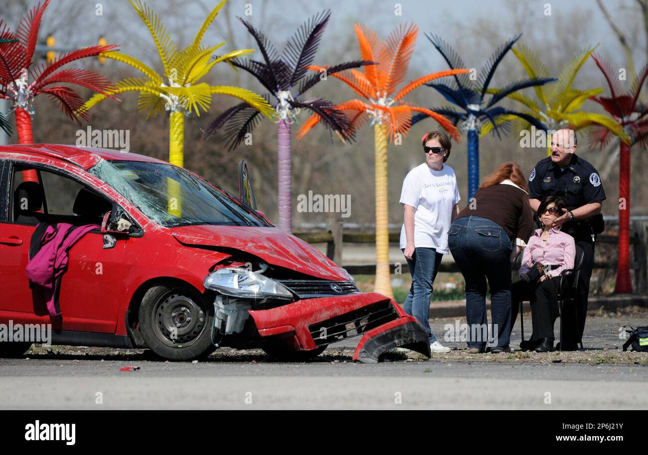 Coal Valley Police Chief Mark Poulos keeps the neck of the driver ...